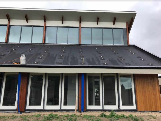 Solar panels on a Bitumen roof.